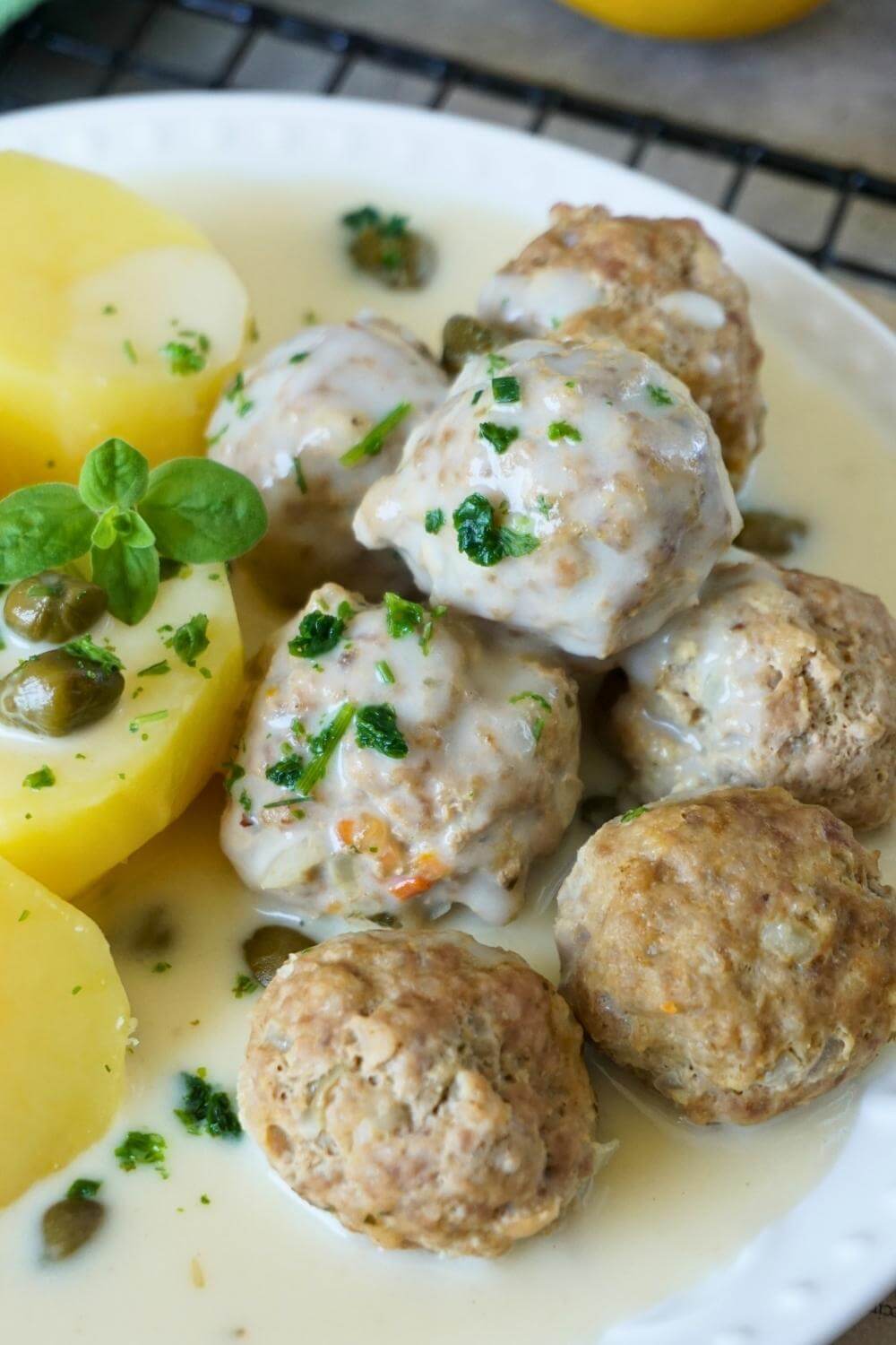 German meatballs with creamy white caper sauce